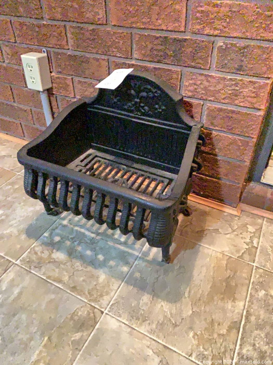 Antique cast iron fireplace grate | Maxsold