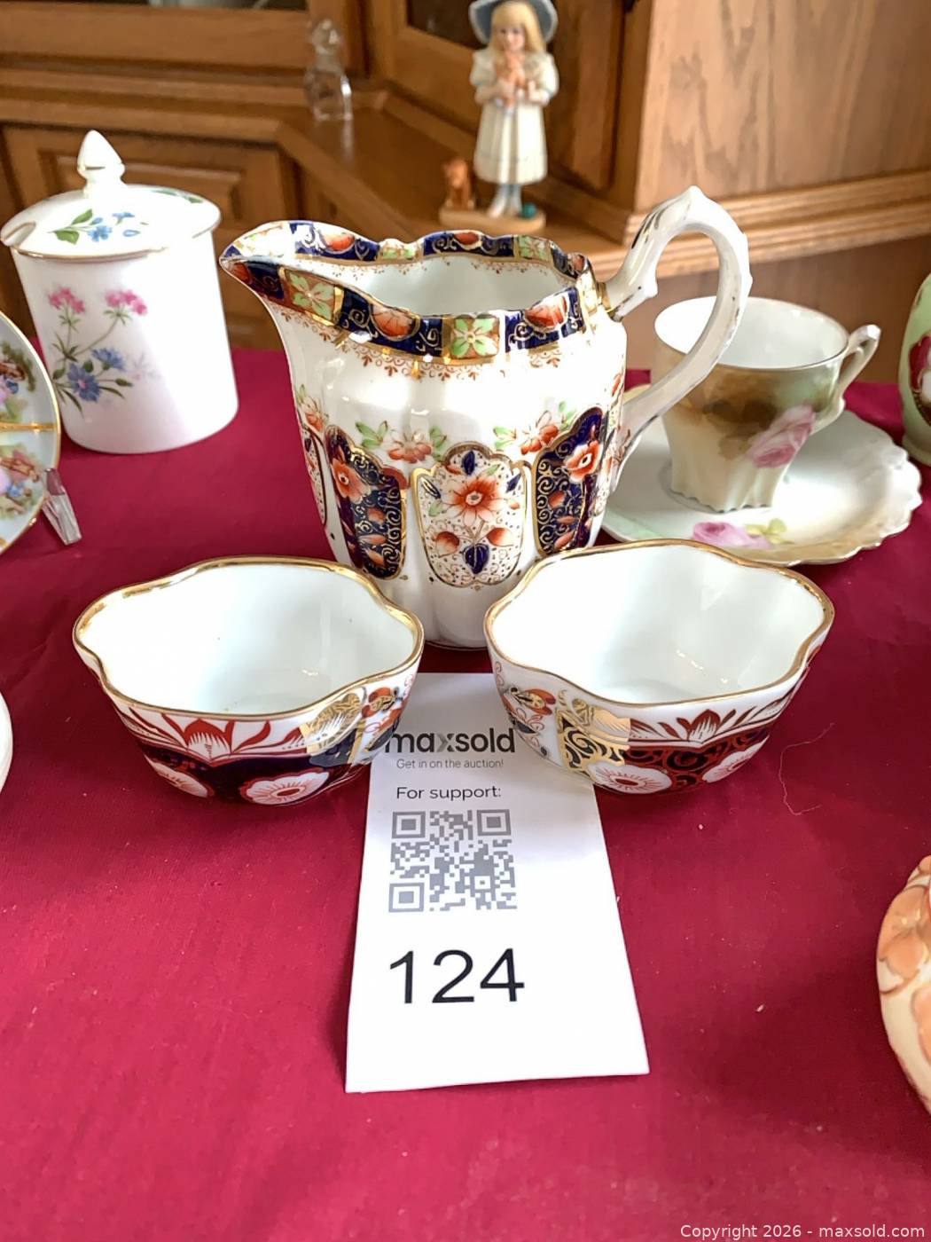 Pair hand-painted porcelain mini pots | Maxsold