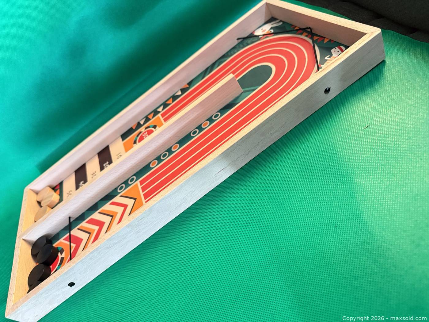 Wooden tabletop disc race game | Maxsold