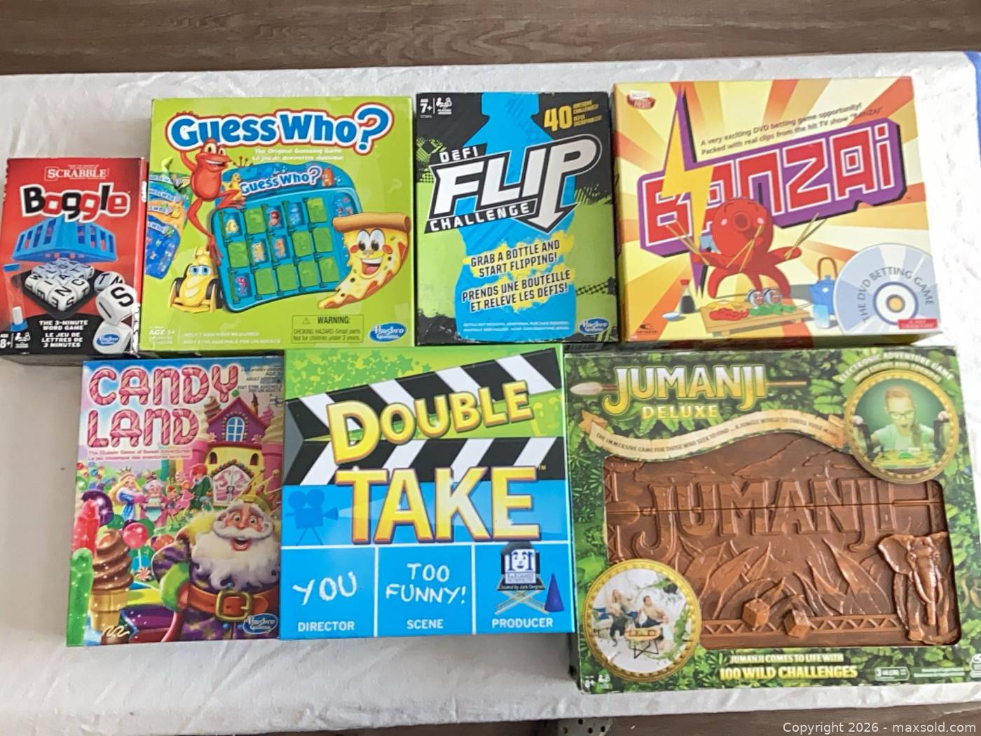 7 board games Candy Land Boggle Guess Who Jumanji | Maxsold