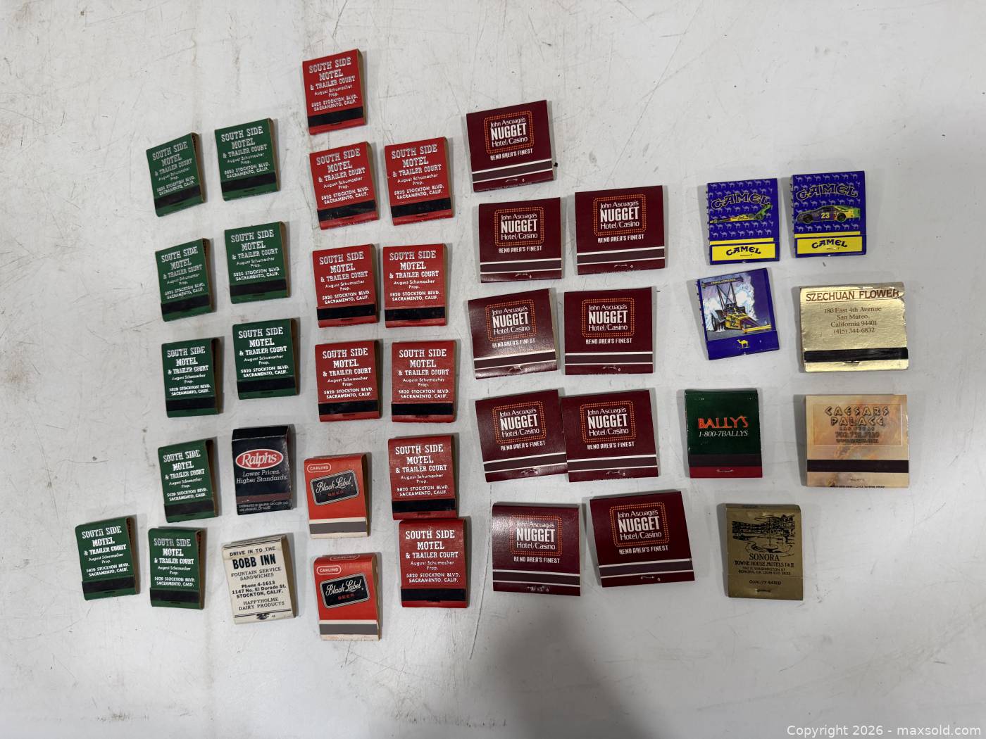 Roulette wheel, advertising matchbooks, metal cigarette case | Maxsold