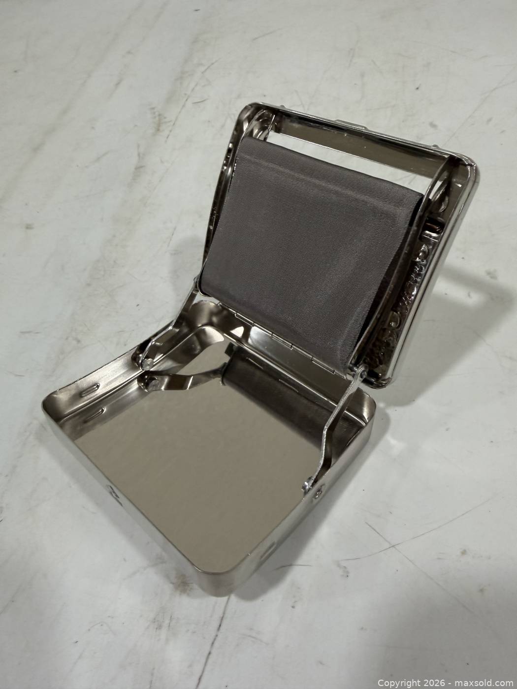 Roulette wheel, advertising matchbooks, metal cigarette case | Maxsold