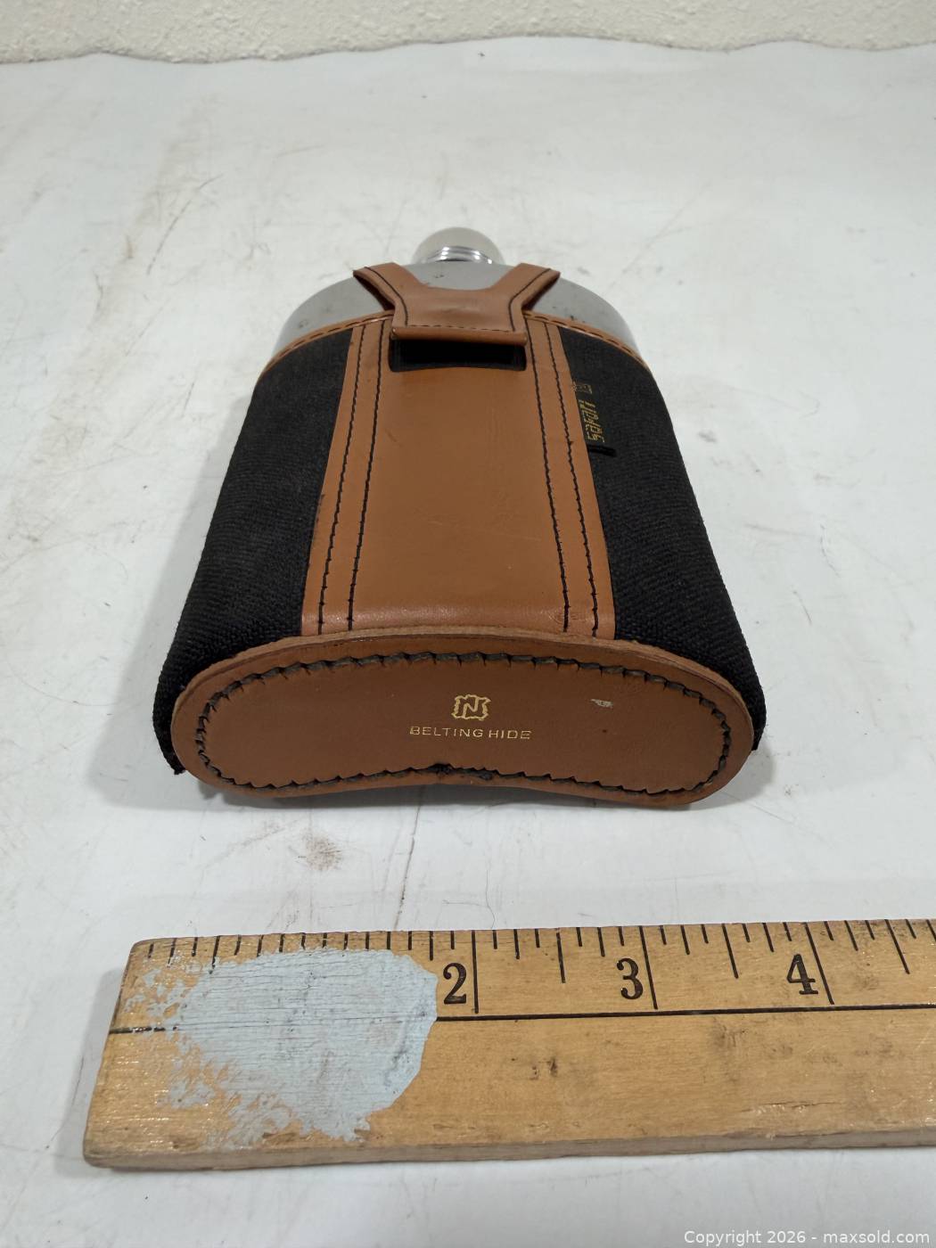 Vintage pocket lighters, flask, Raiders watch, matches, accessories ...