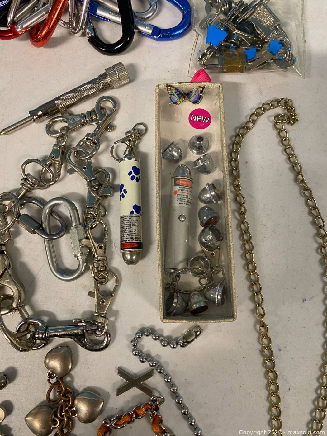 Mixed keychains, padlocks, carabiners, charms, chains & small tools ...