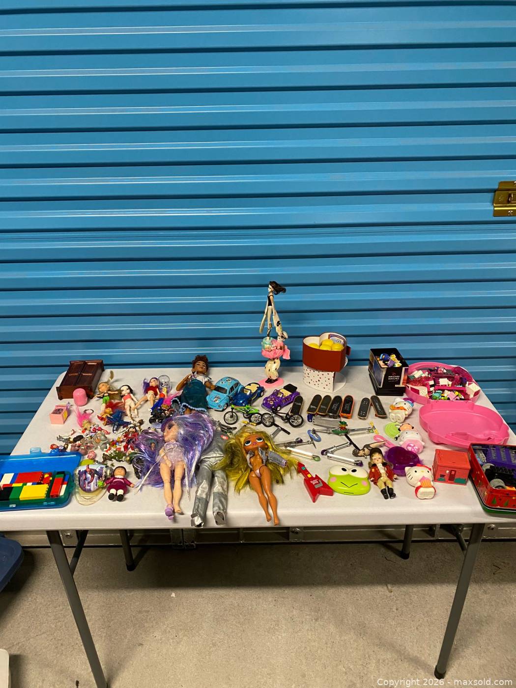 Mixed toy lot Barbie dolls Hello Kitty & bricks | Maxsold