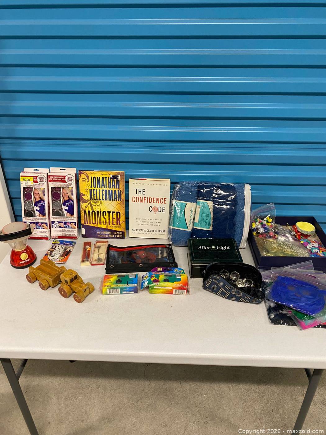 Mixed vintage and modern books, toys, crafts, spoons, cameras | Maxsold