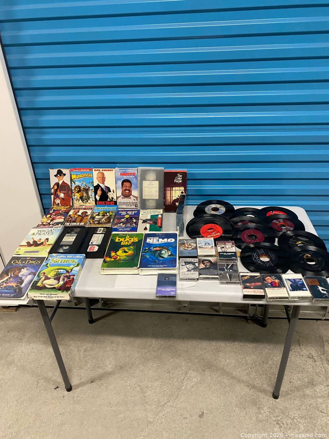 Mixed media: 45 RPM vinyl, cassettes, VHS & DVDs | Maxsold