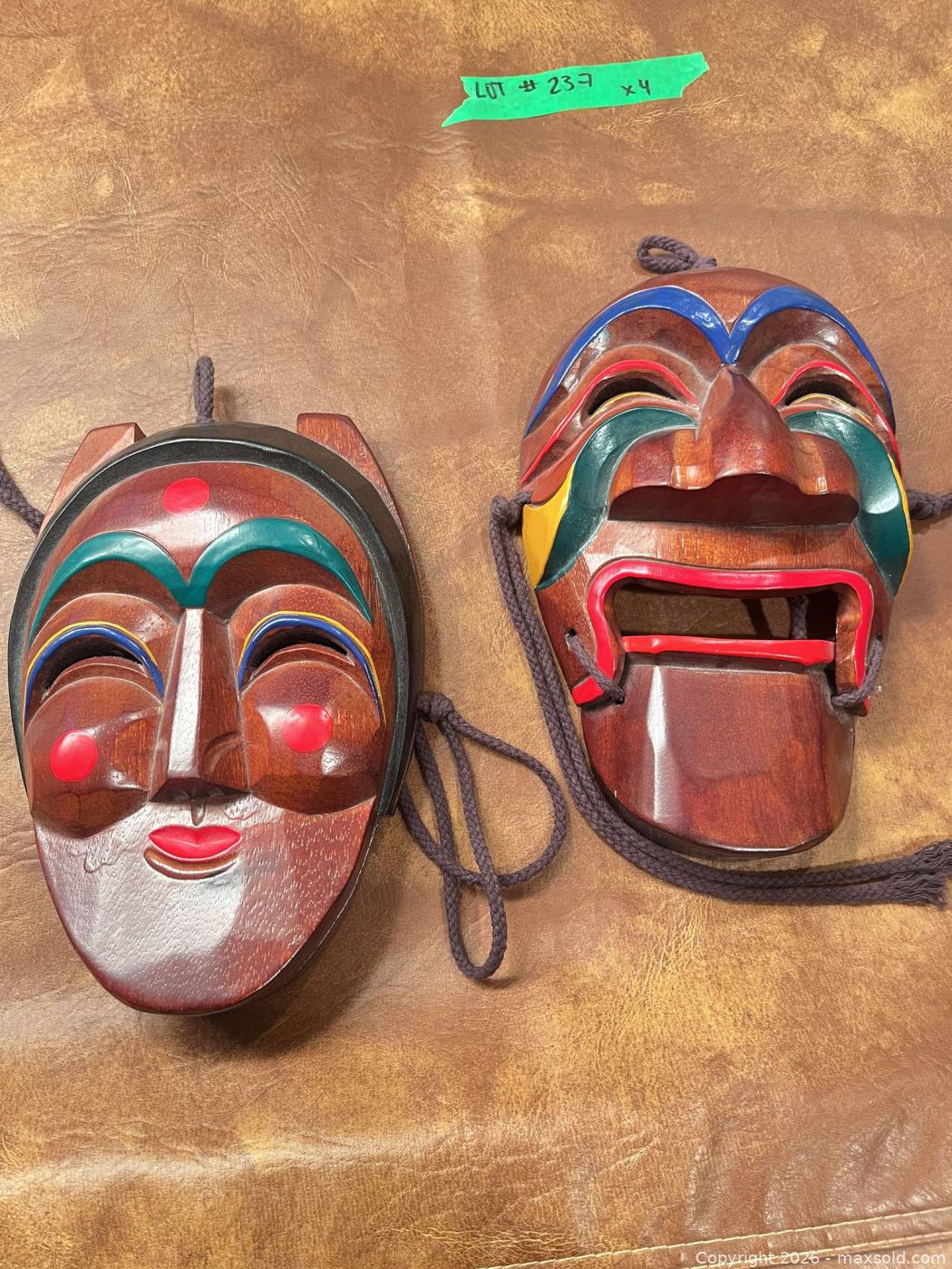 Four Hand-Carved Wooden Masks | Maxsold