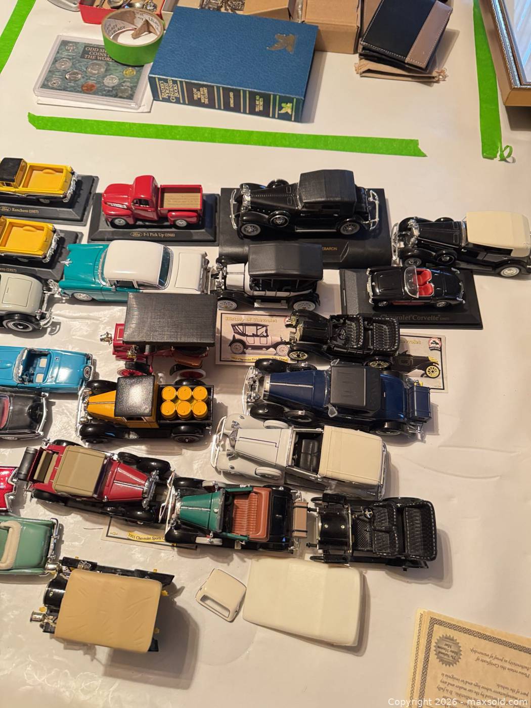 Collection of die-cast model cars with certificates | Maxsold