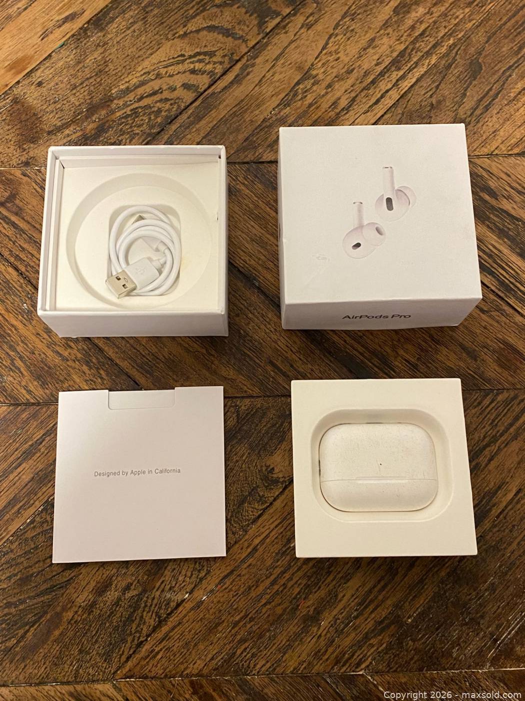 Apple AirPods Pro with charging case | Maxsold