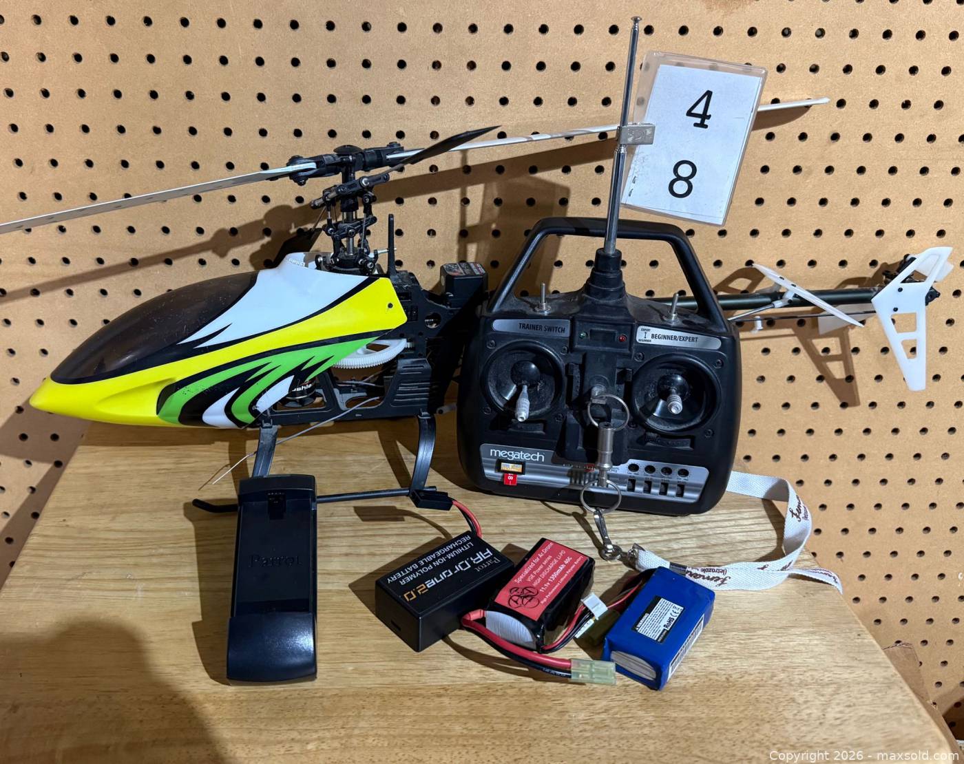 Megatech RC helicopter, transmitter, batteries | Maxsold