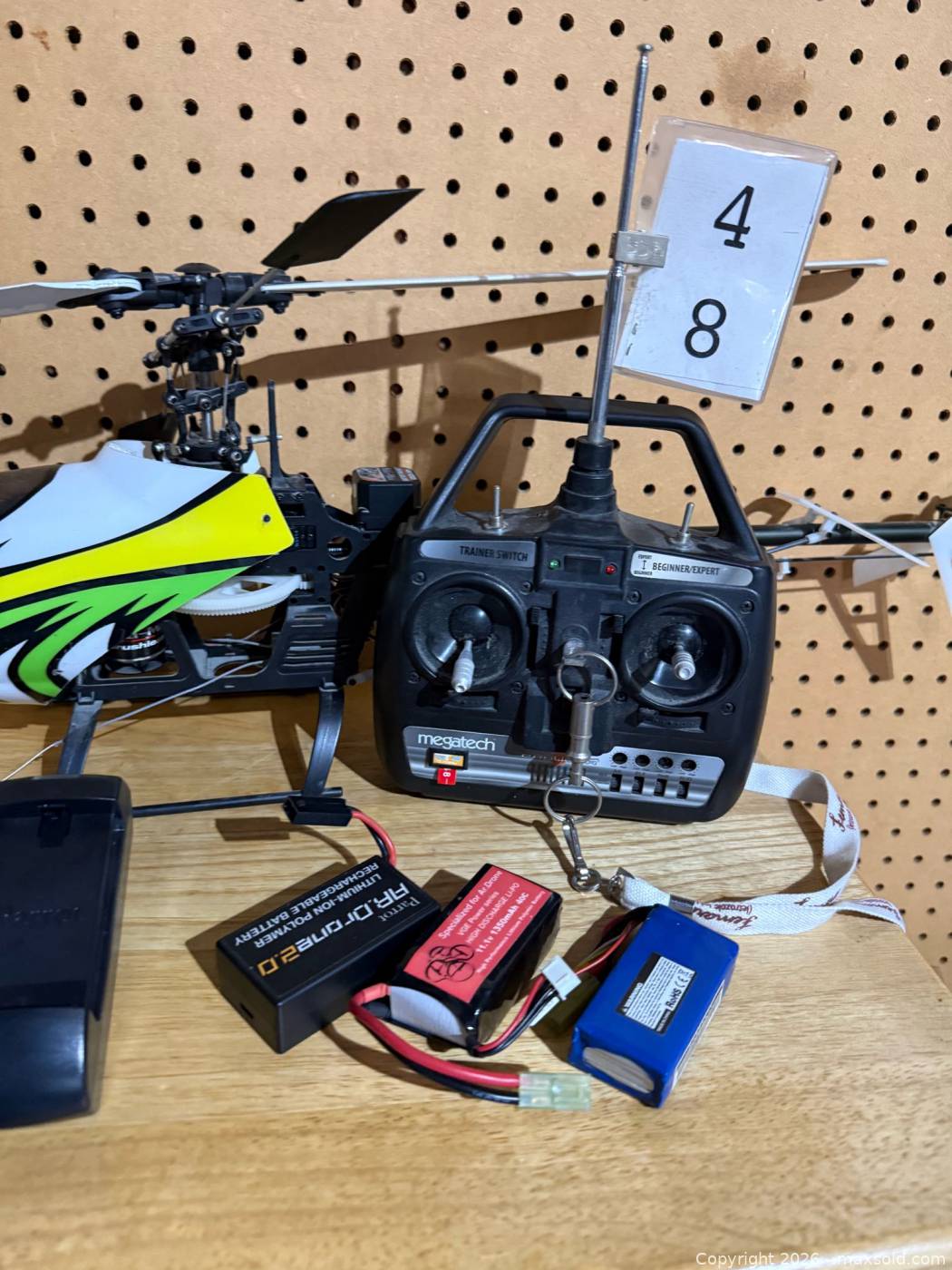 Megatech RC helicopter, transmitter, batteries | Maxsold