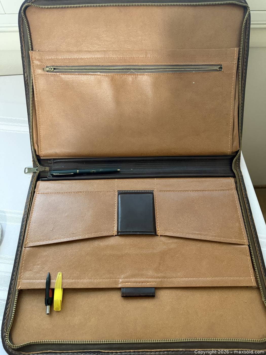 Vintage leather zip briefcase with pens | Maxsold