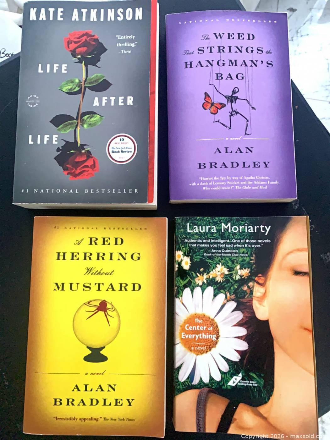 Lot of 4 soft cover fiction books | Maxsold
