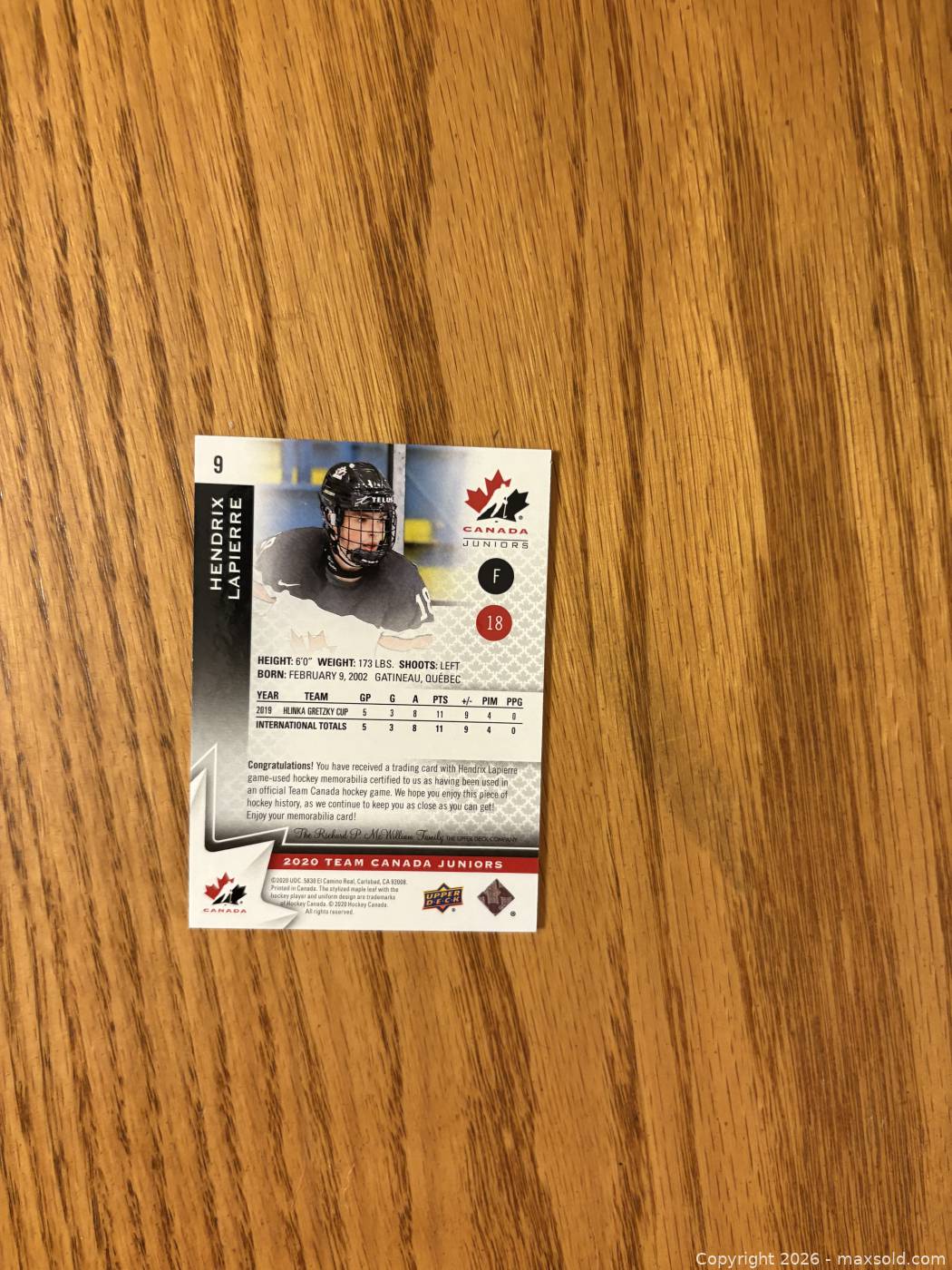 Hendrix Lapierre jersey trading card | Maxsold