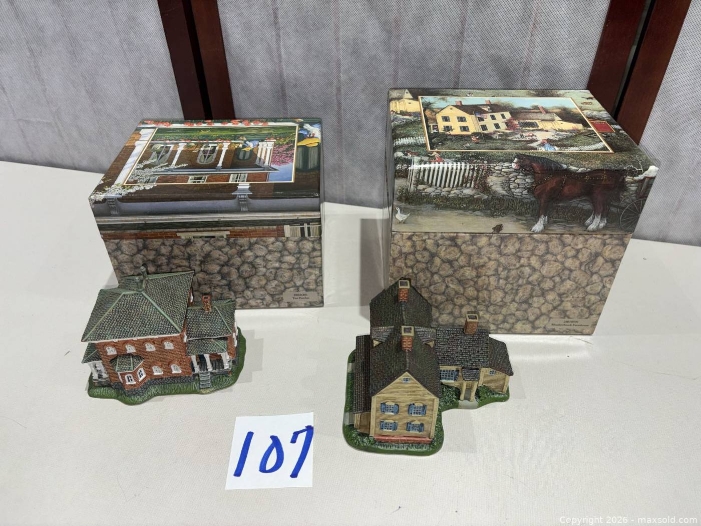 Pair Town Hall ceramic houses | Maxsold
