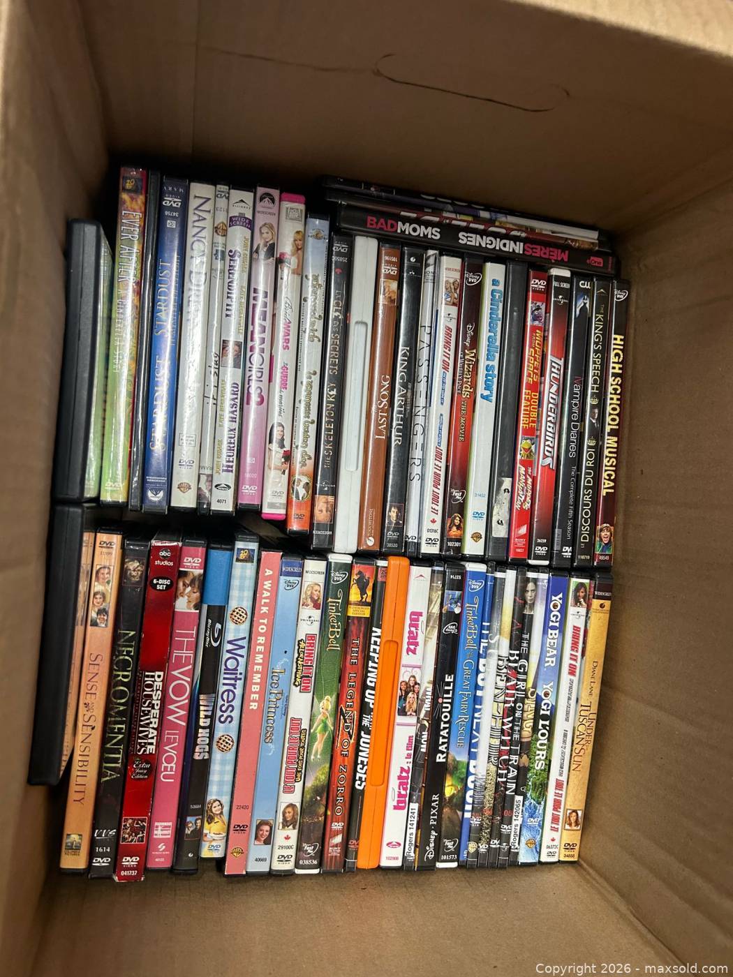 Box of 50+ DVD movies | Maxsold