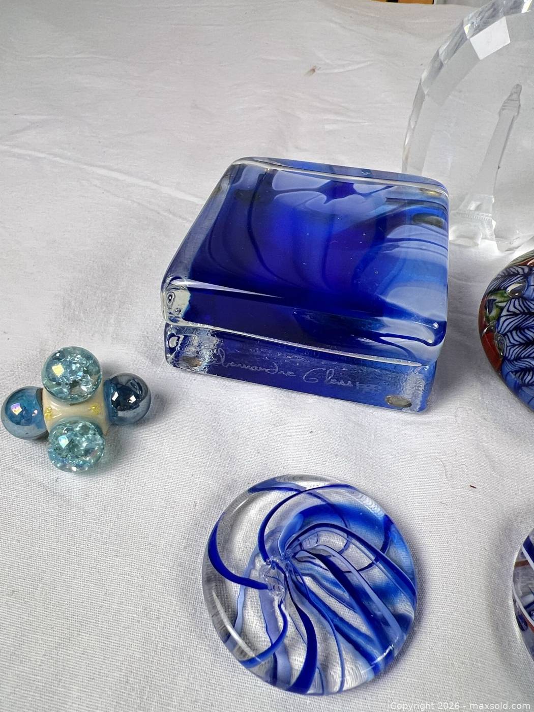 Seven glass paperweights | Maxsold