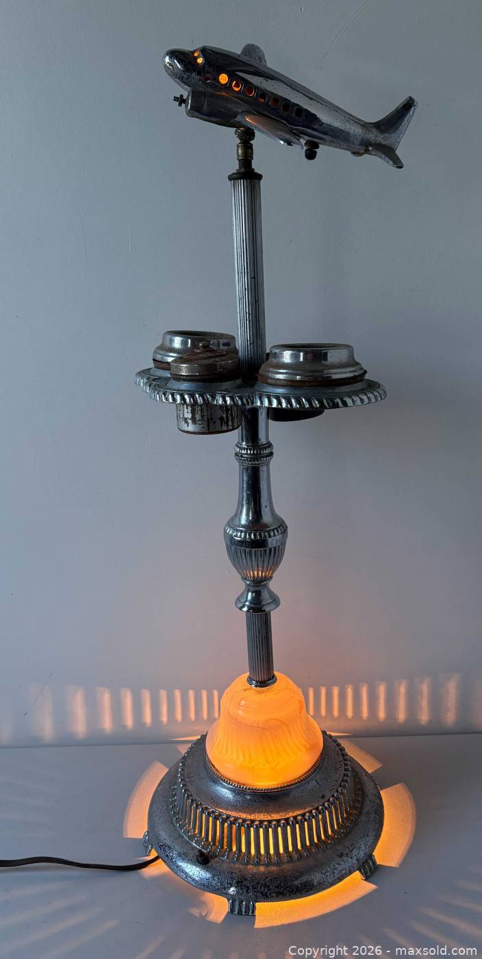 Art Deco chrome illuminated airplane ashtray lamp stand | Maxsold