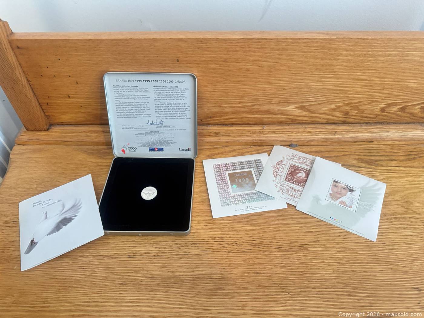 Canada 2000 commemorative coin & stamp set | Maxsold
