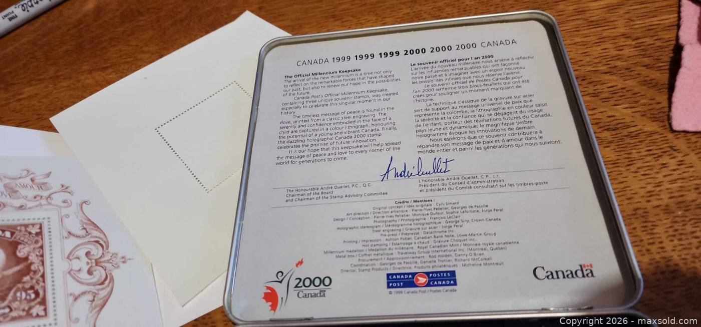 Canada Post 2000 Millennium coin & stamp set | Maxsold