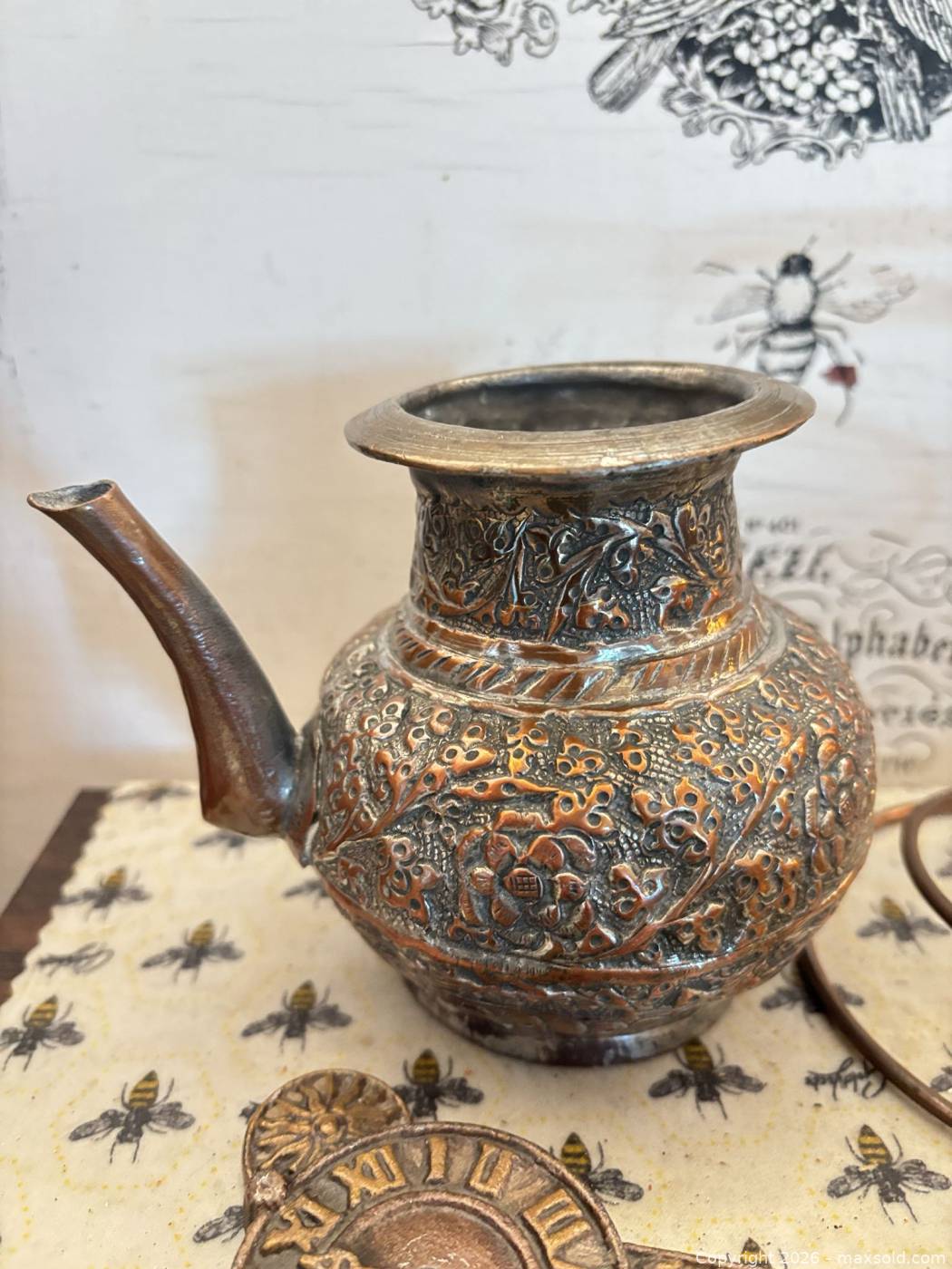 Mixed metal ewer, cup holder, trivets & spring | Maxsold