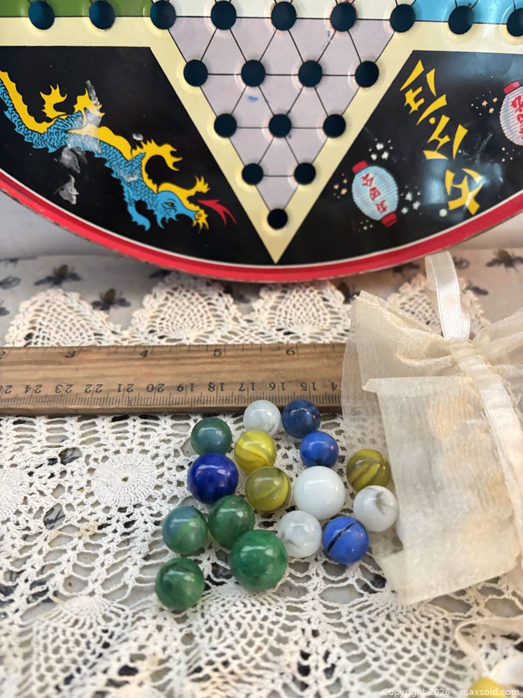 Reversible tin Chinese Checkers / Chess board with marbles | Maxsold