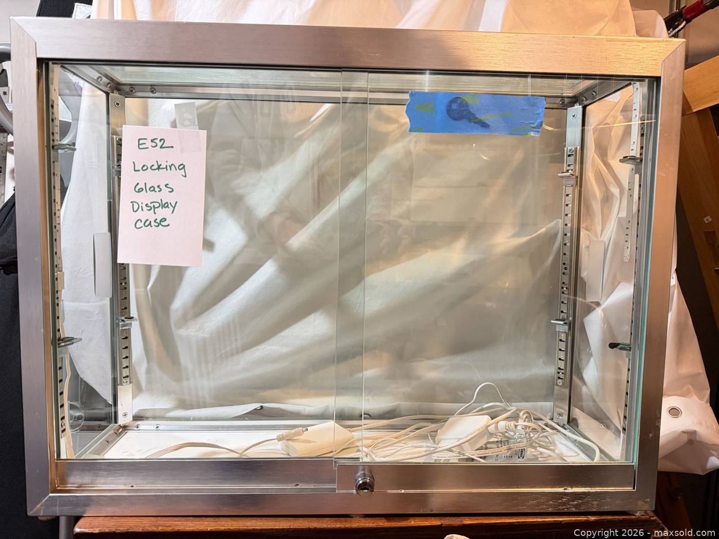 Glass display case with locking front | Maxsold