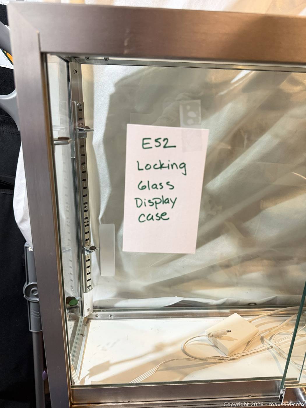 Glass display case with locking front | Maxsold
