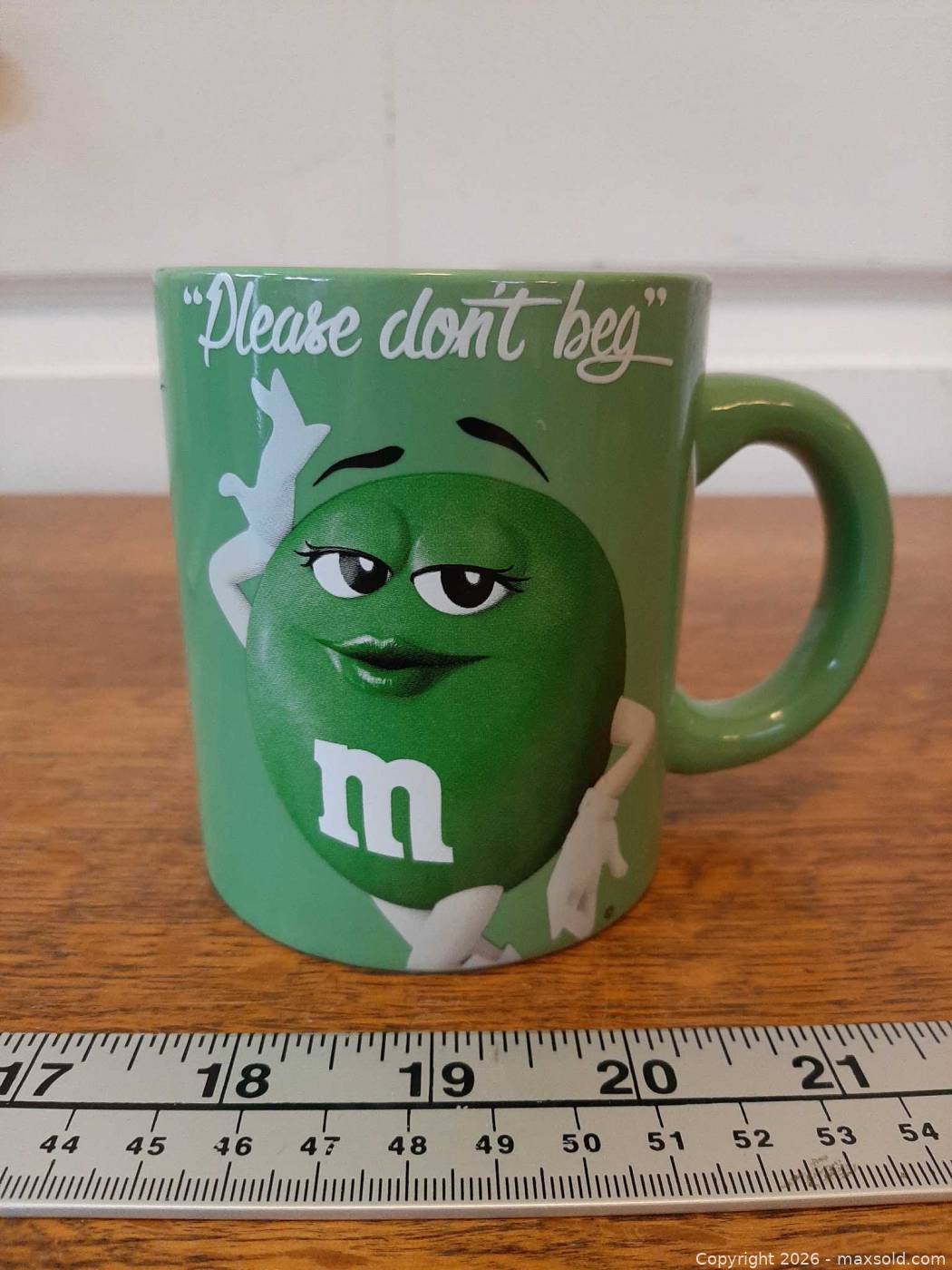 Green M&M's Ms. Green 12oz Ceramic Mug | Maxsold