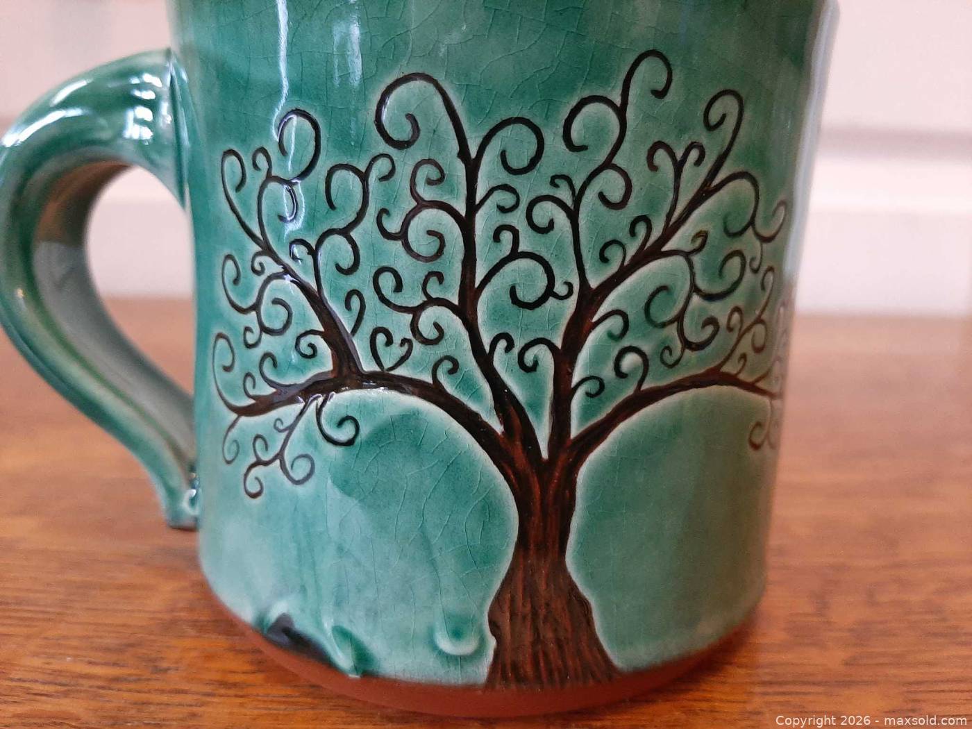 Black Crow Pottery Tree of Life mug | Maxsold