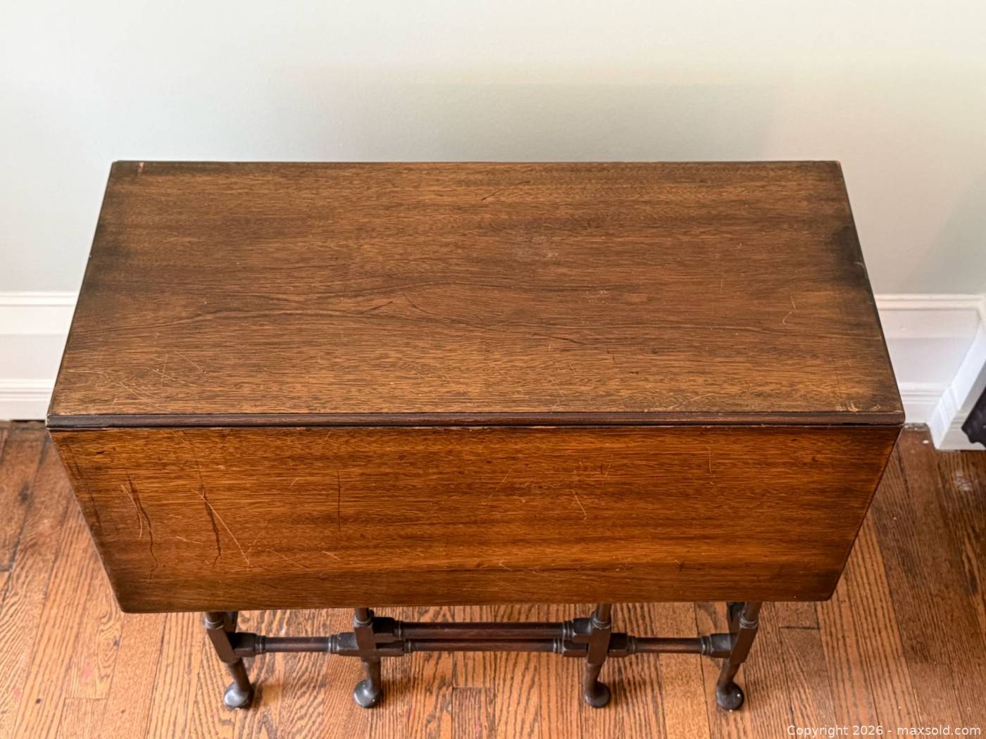 Walnut drop leaf gate leg side table | Maxsold