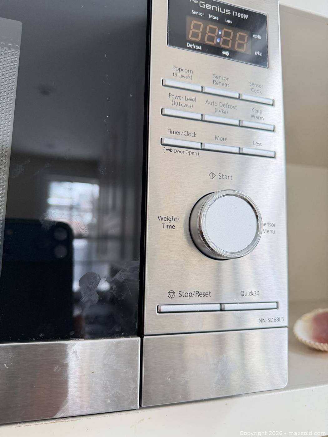 Panasonic Genius 1100W Stainless Microwave Oven | Maxsold