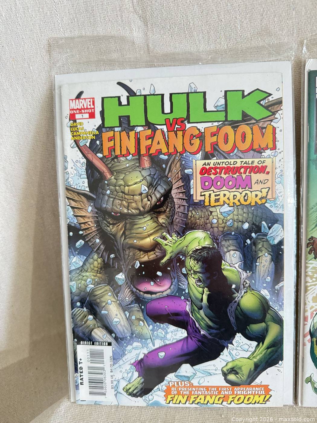 Hulk vs Fin Fang Foom & Marvel Universe vs Wolverine #2 Comics | Maxsold