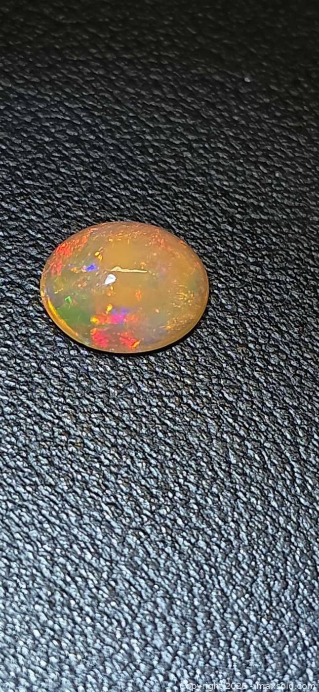 2.29ct untreated chocolate fire opal cabochon | Maxsold