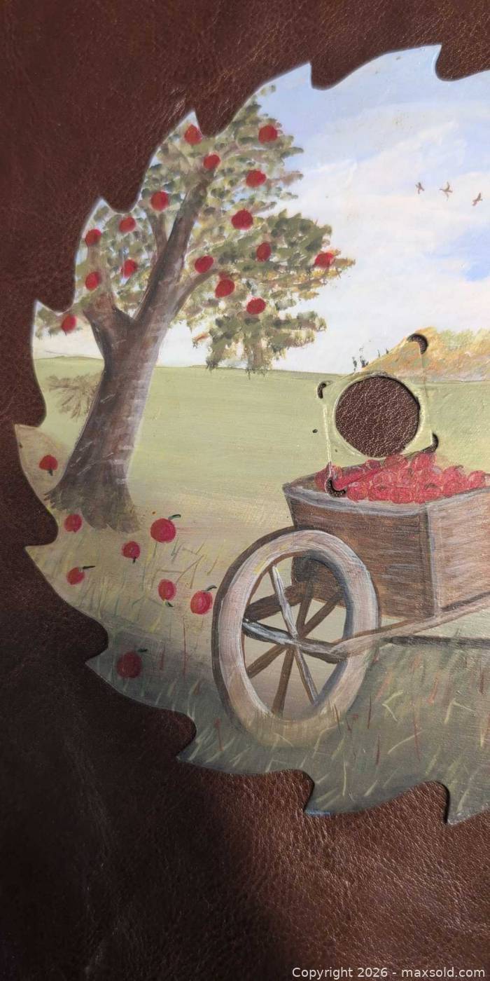 Ruth Brooks painted circular saw blade art | Maxsold