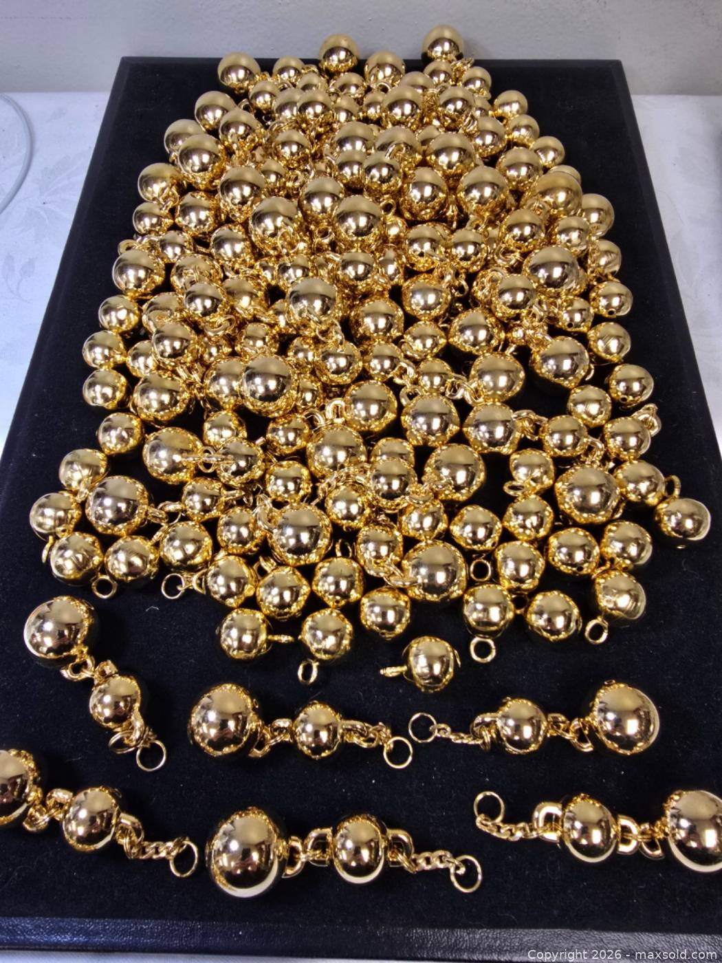 1.477 kg gold-tone spherical bead strands | Maxsold