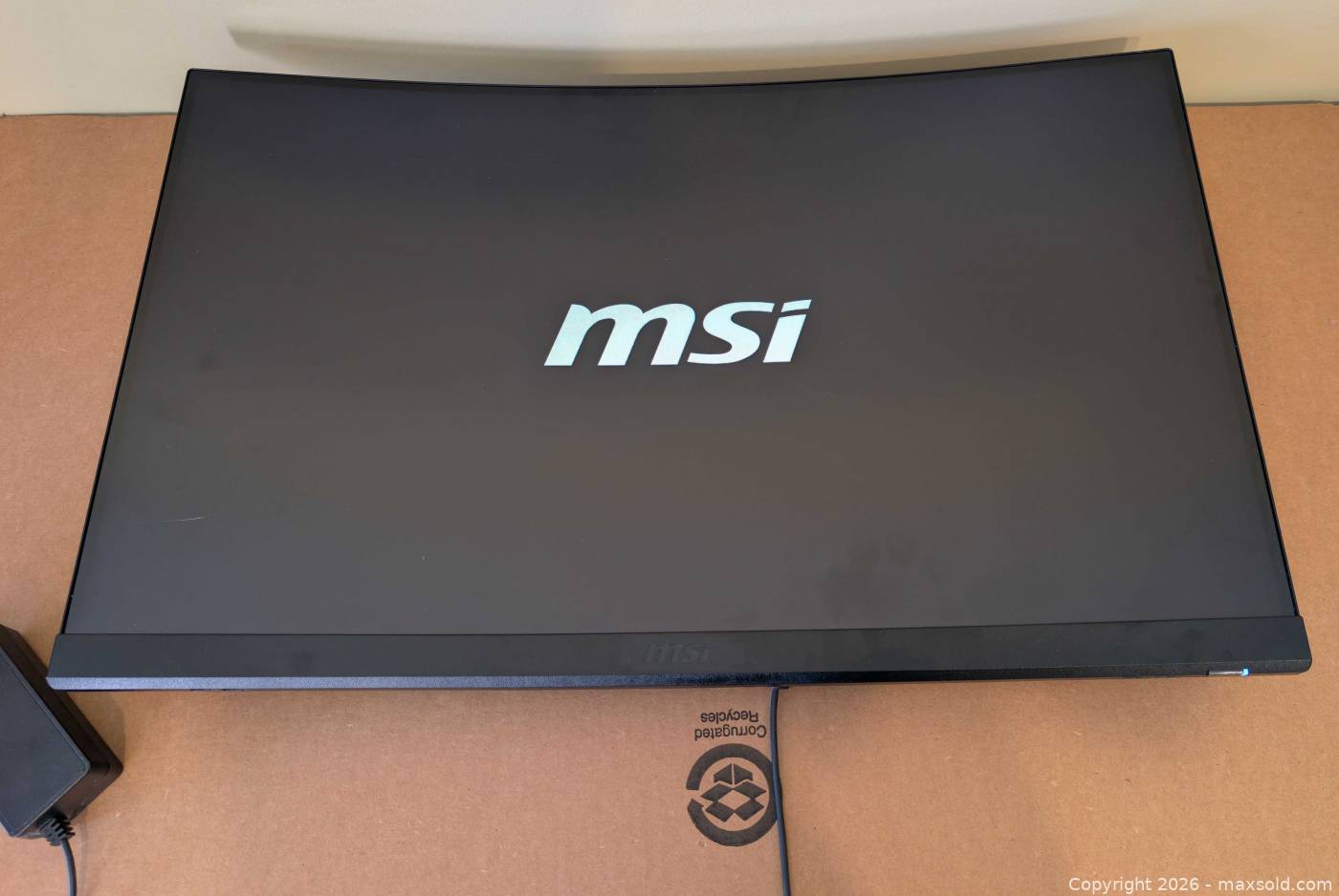 MSI Optix G27C5 27" curved monitor | Maxsold