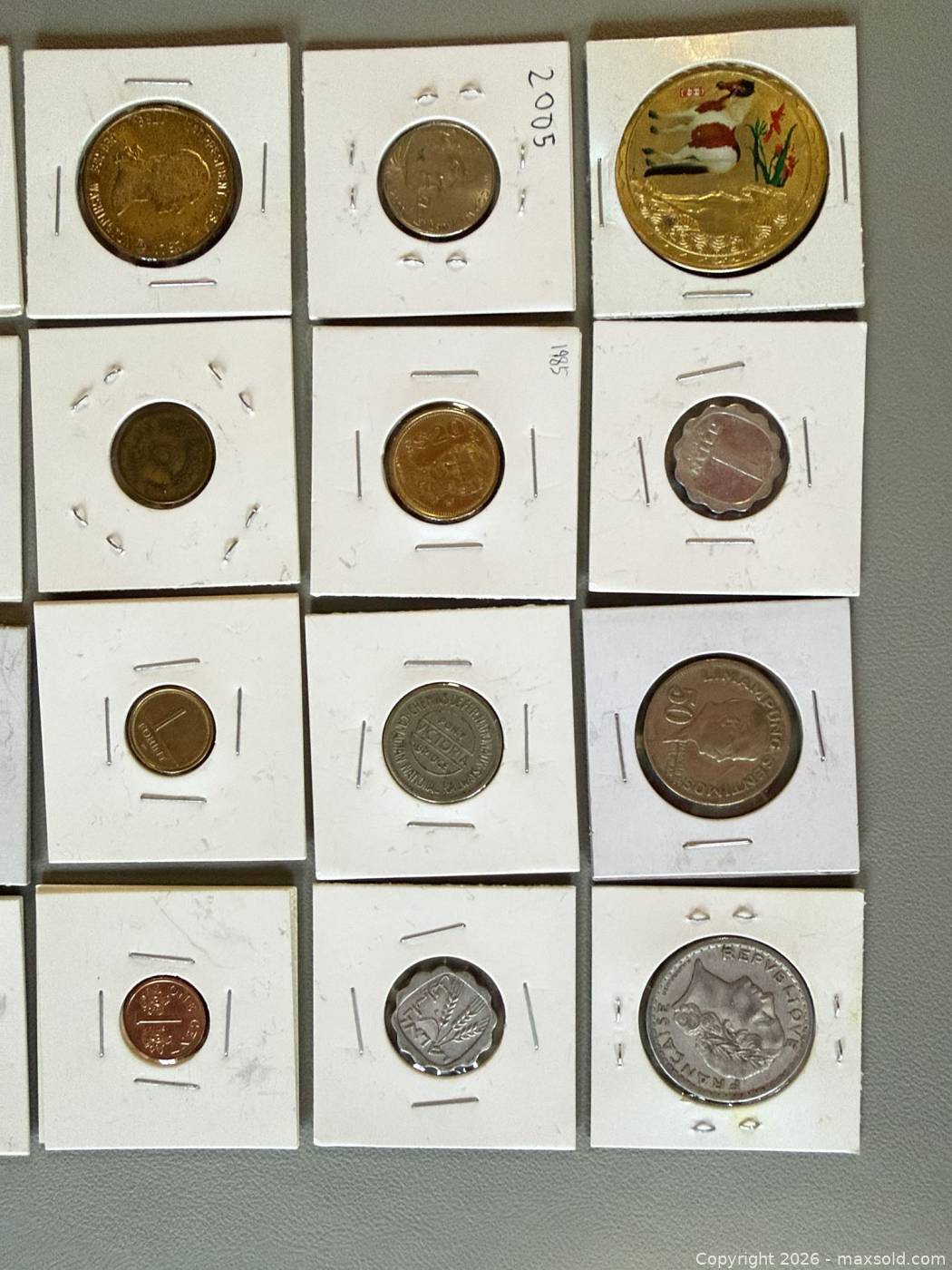 20 vintage collectible coins and tokens | Maxsold