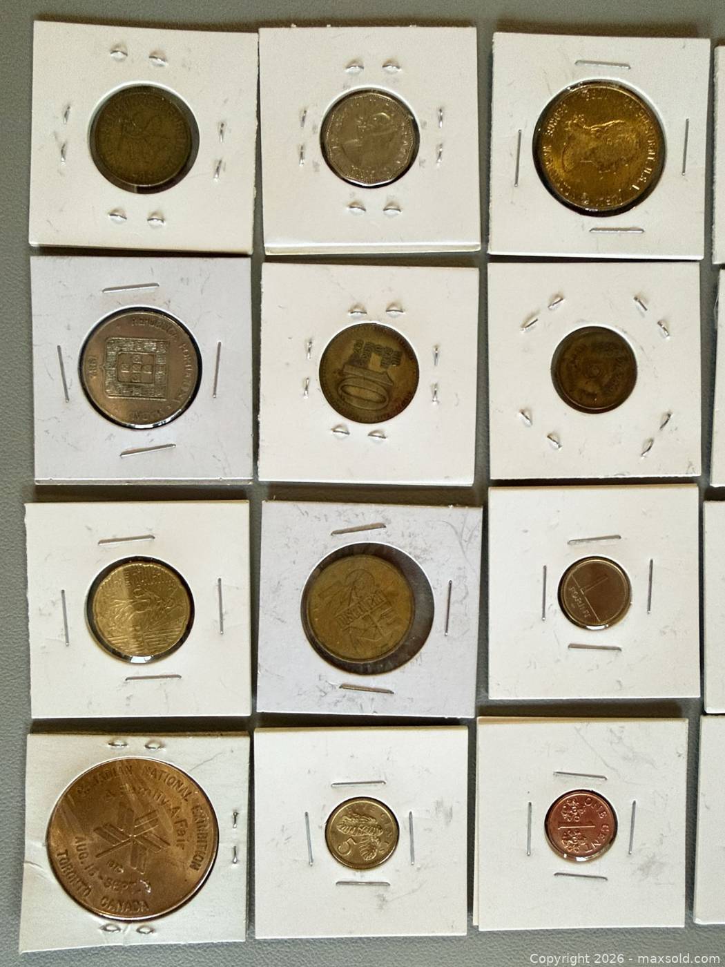 20 vintage collectible coins and tokens | Maxsold