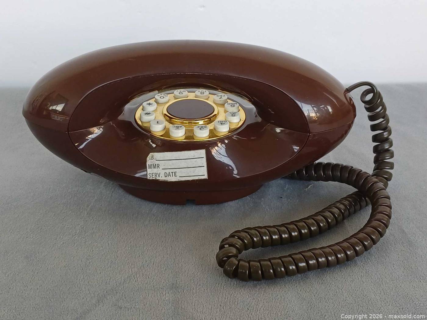 Vintage donut shape rotary dial telephone | Maxsold