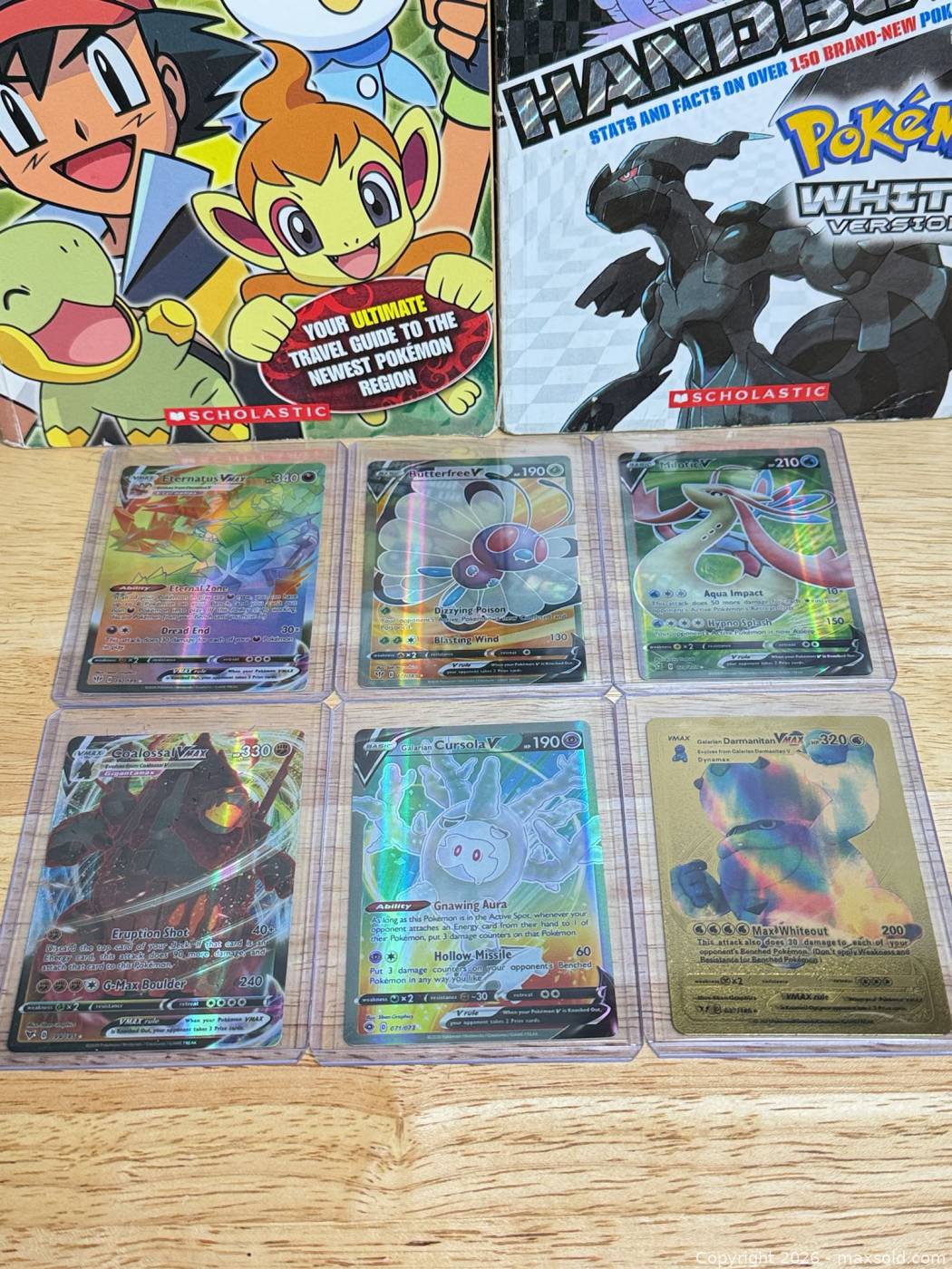 Pokémon cards with two guide books | Maxsold