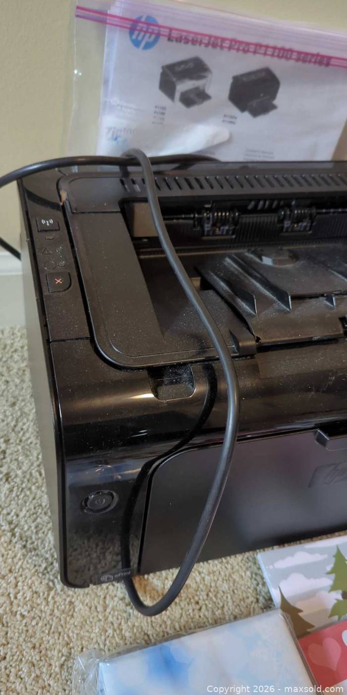 HP LaserJet P1102W printer, globe, organizers & stationery | Maxsold