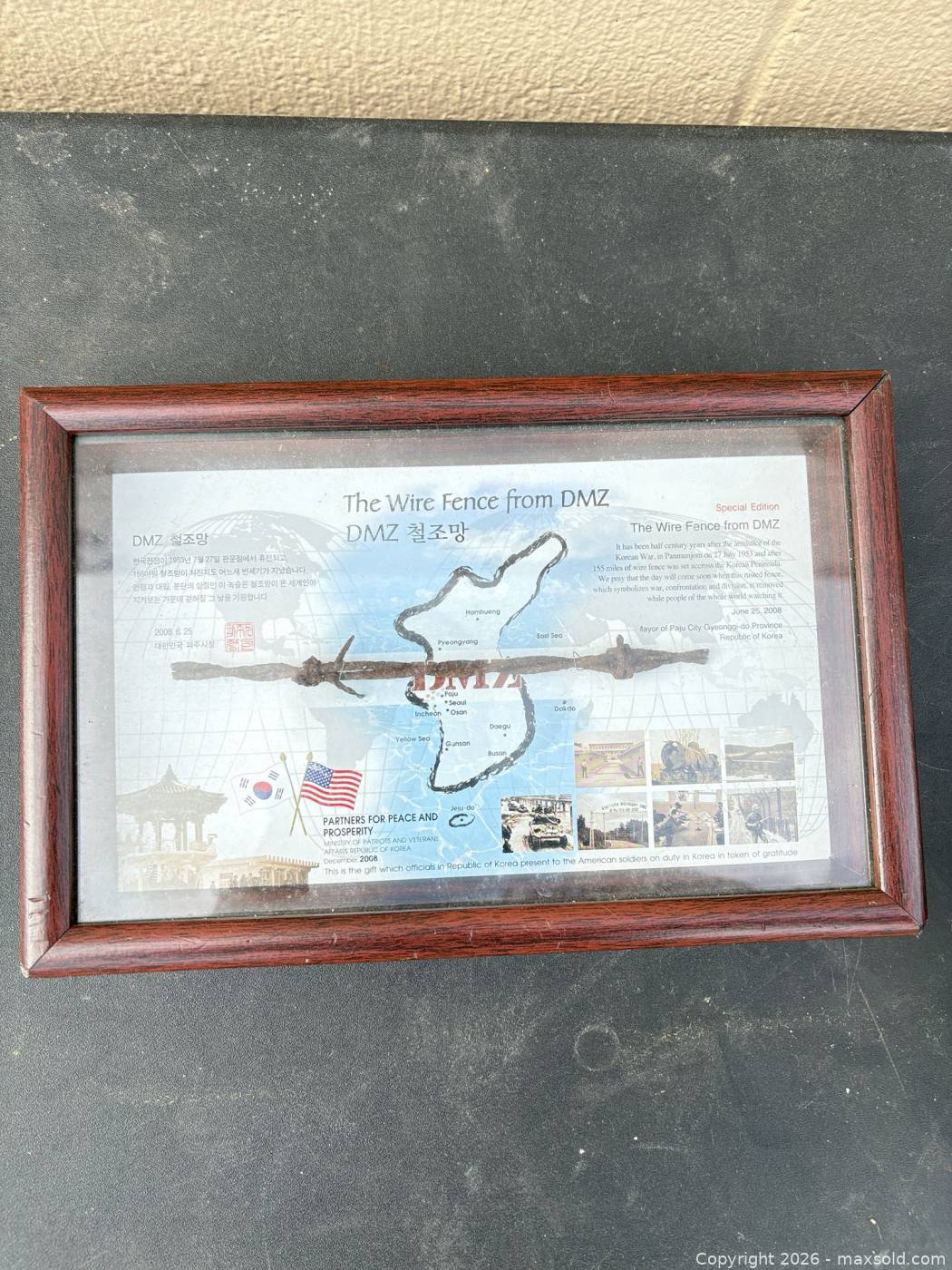 Framed Korean DMZ wire commemorative plaque | Maxsold
