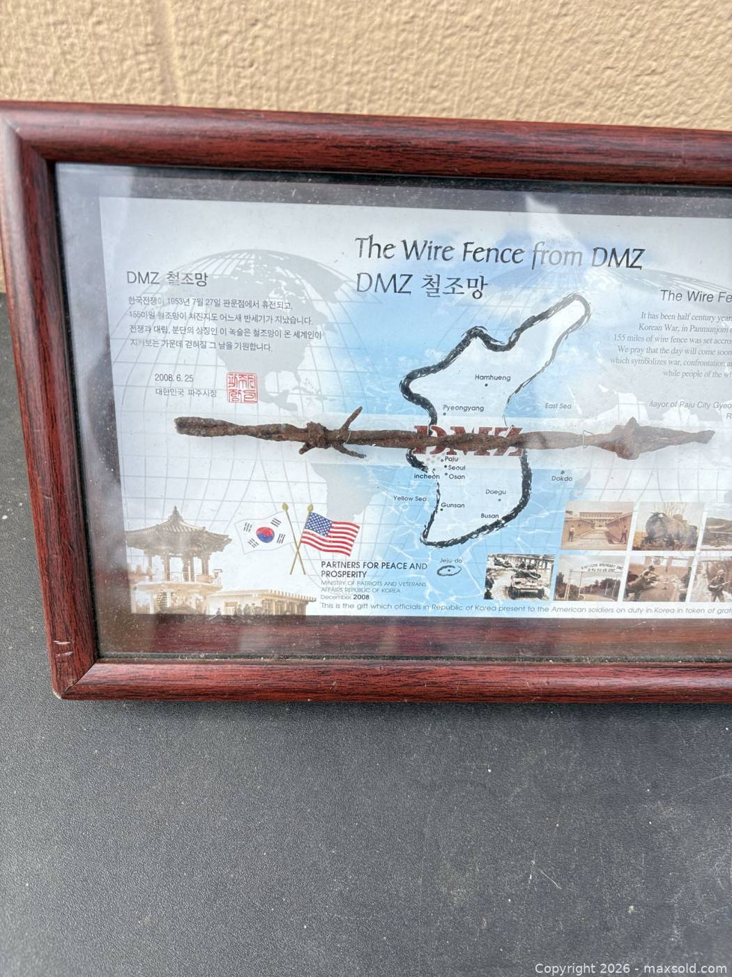 Framed Korean DMZ wire commemorative plaque | Maxsold
