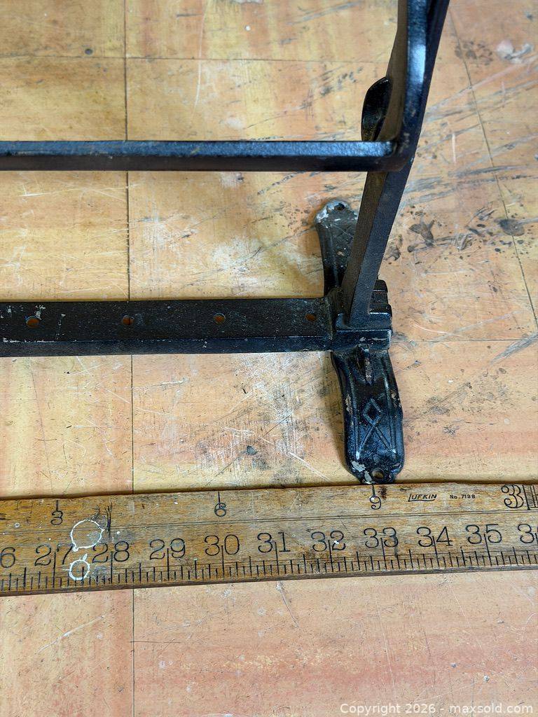 Old cast iron shop paper roll holder | Maxsold
