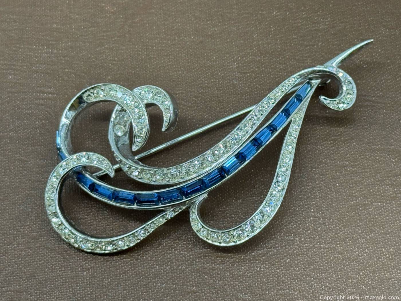 Vintage Boucher blue rhinestone brooch | Maxsold