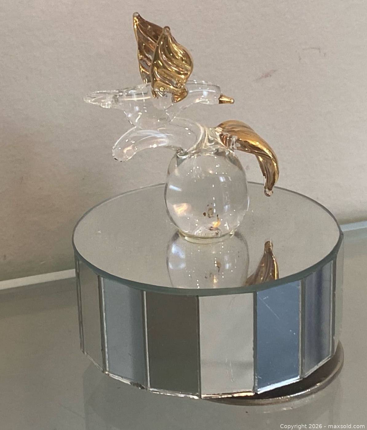 1980s Lear mirrored glass bird music box | Maxsold