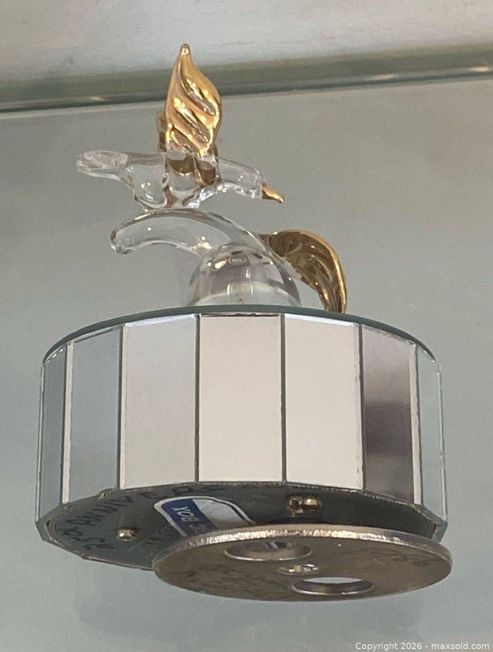 1980s Lear mirrored glass bird music box | Maxsold