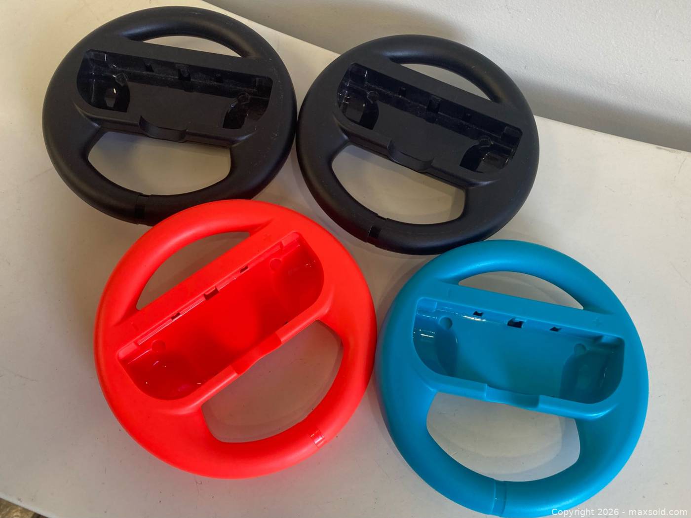 Nintendo Switch Pikachu case plus 4 Joy-Con wheels | Maxsold